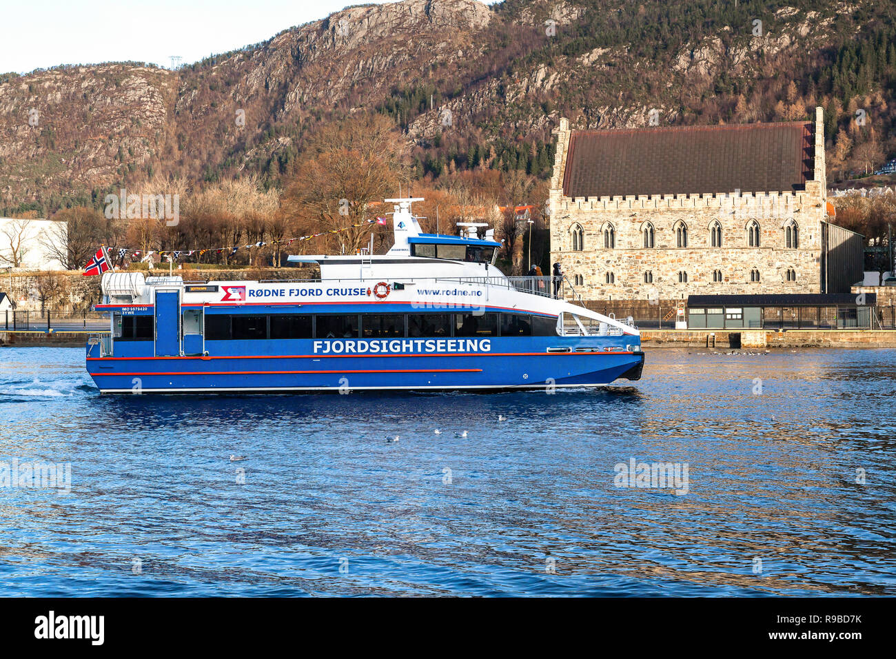 High speed passenger catamaran Rygertroll arriving in the port of ...