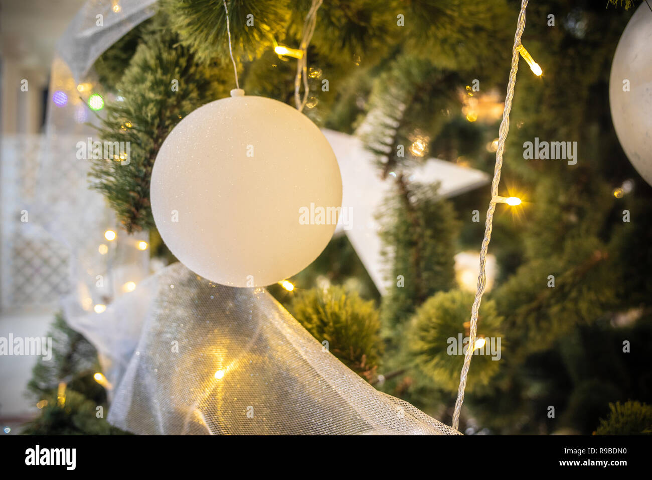 Classic toys on new year tree illuminated with led lights Stock Photo ...