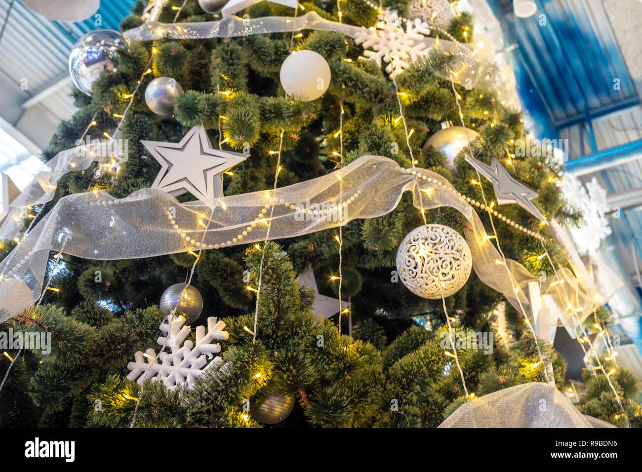 Classic toys on new year tree illuminated with led lights Stock Photo ...