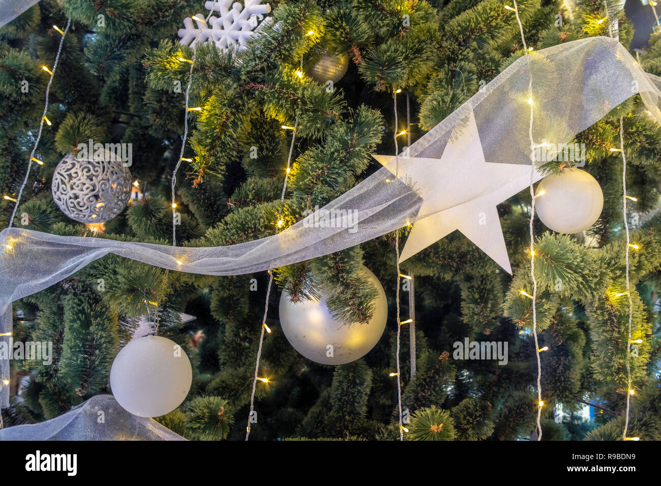 Classic toys on new year tree illuminated with led lights Stock Photo ...