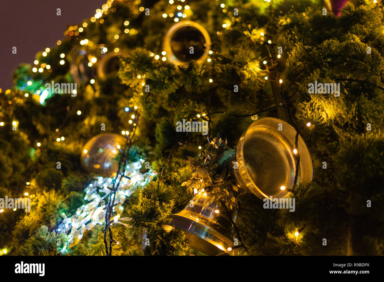 Classic toys on new year tree illuminated with led lights Stock Photo ...