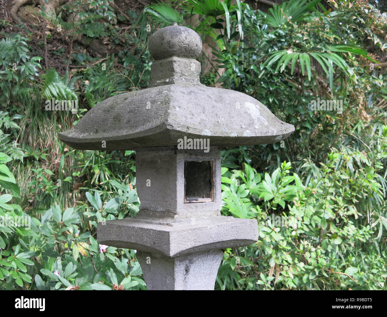 Traditional Japanese stone lantern in the grounds of the Taya Caves at ...
