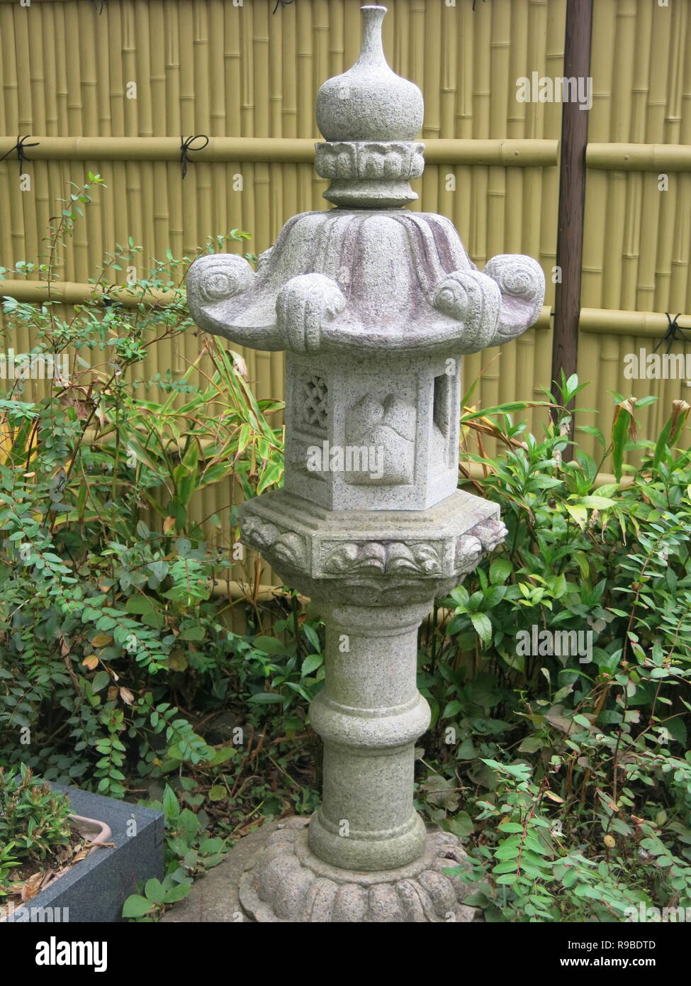 Traditional Japanese stone lantern in the grounds of the Taya Caves at ...