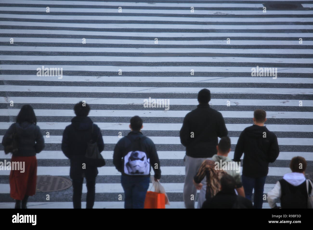 Tokyo/Japan- January 14 2018: japanese cross the road on Shibuya street ...