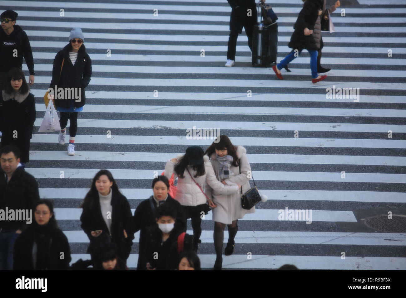 Tokyo/Japan- January 14 2018: japanese cross the road on Shibuya street ...