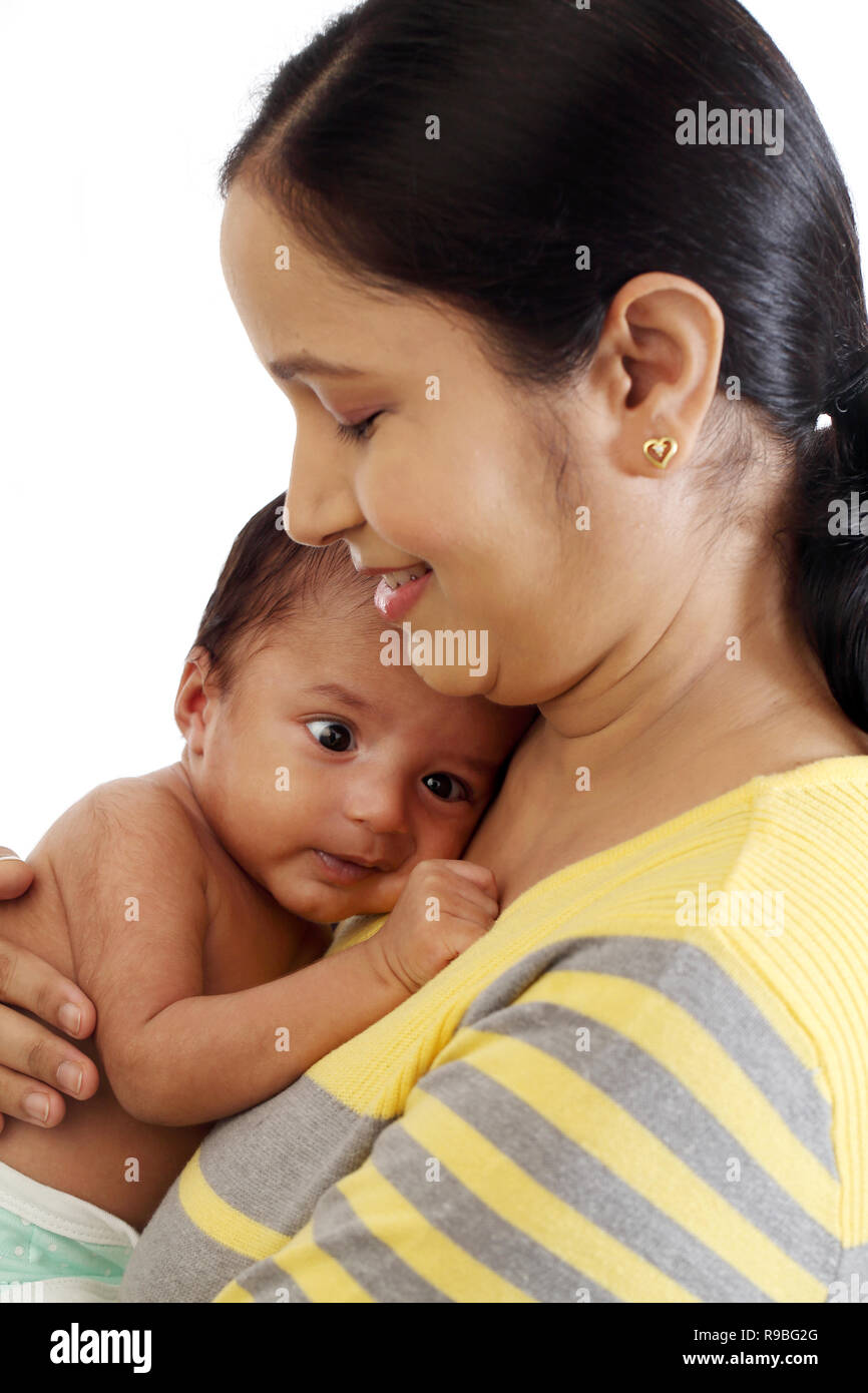 Cheerful mother with newborn baby Stock Photo - Alamy