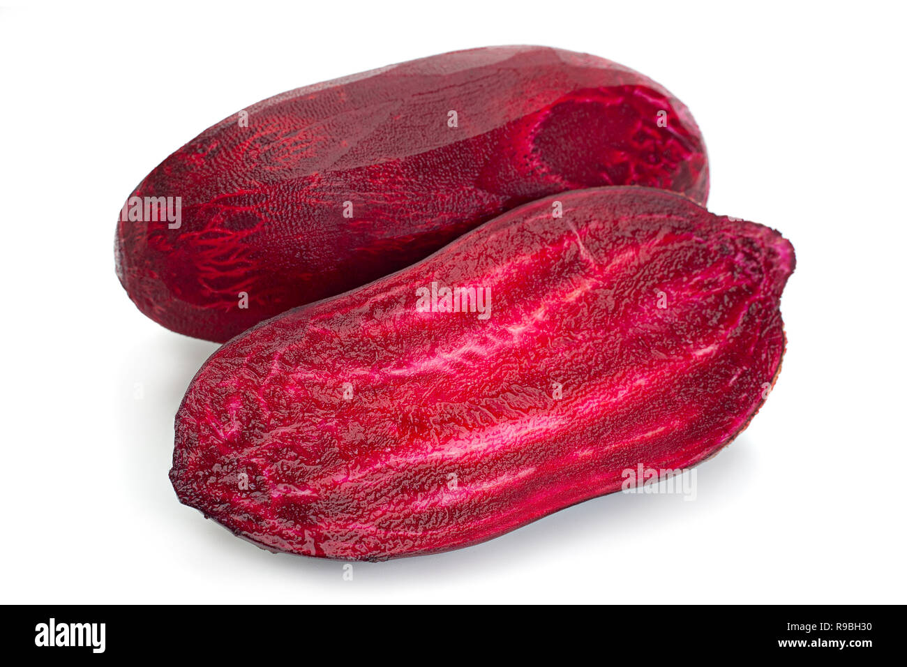 Long beet root closeup isolated on white background Stock Photo - Alamy