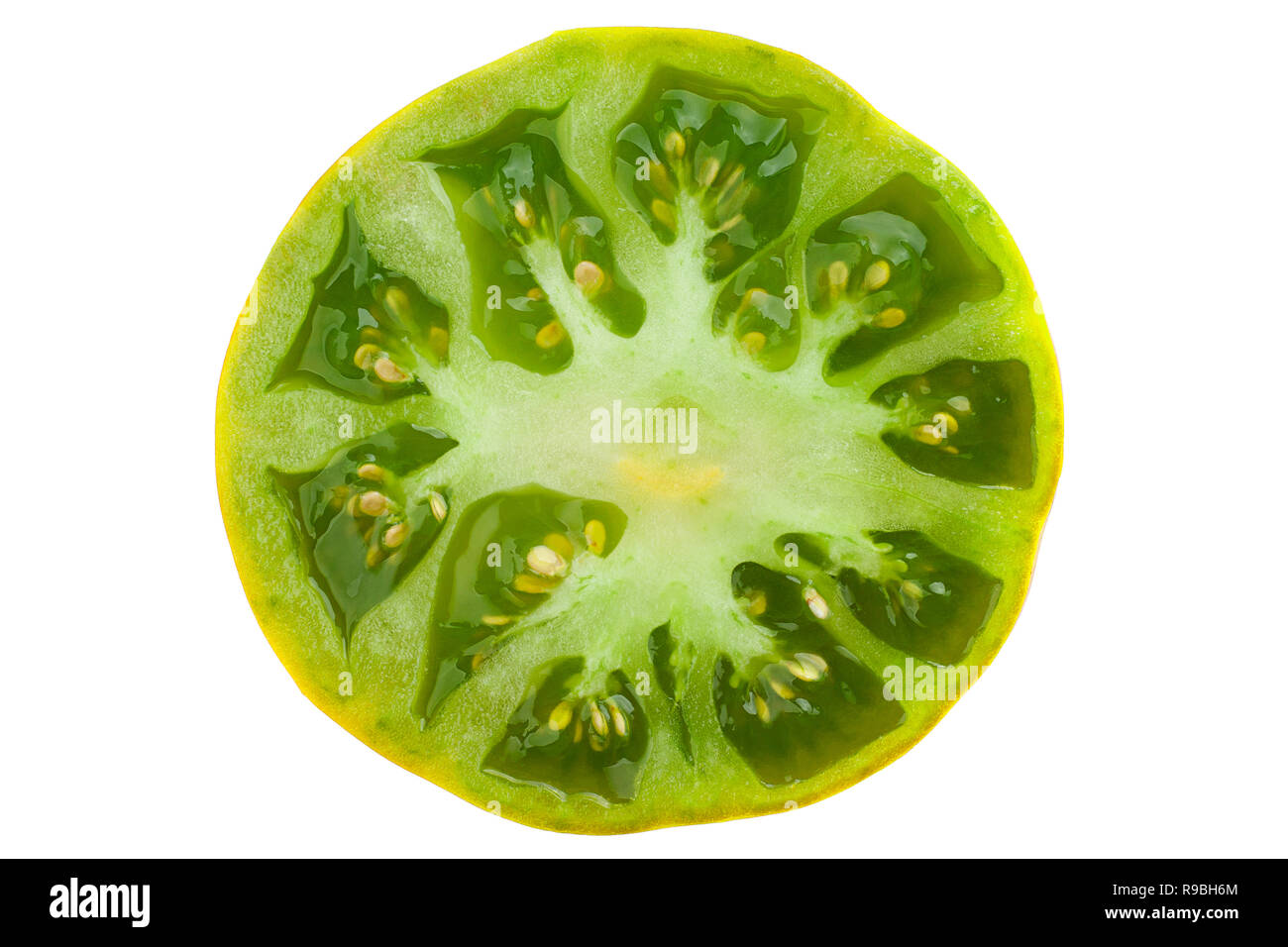 Green ripe tomatoes "Magic Glow" isolated on white Stock Photo - Alamy