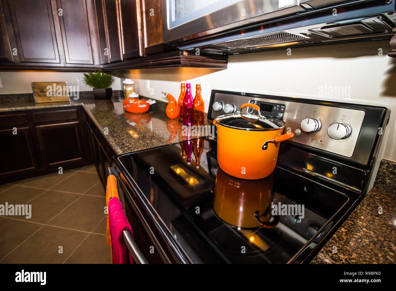 Modern Kitchen With Granite Counter And Stove Stock Photo - Alamy