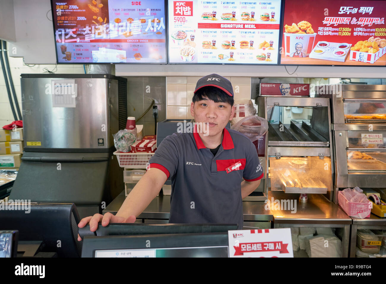 SEOUL, SOUTH KOREA - CIRCA MAY, 2017: indoor portrait of staff at KFC ...