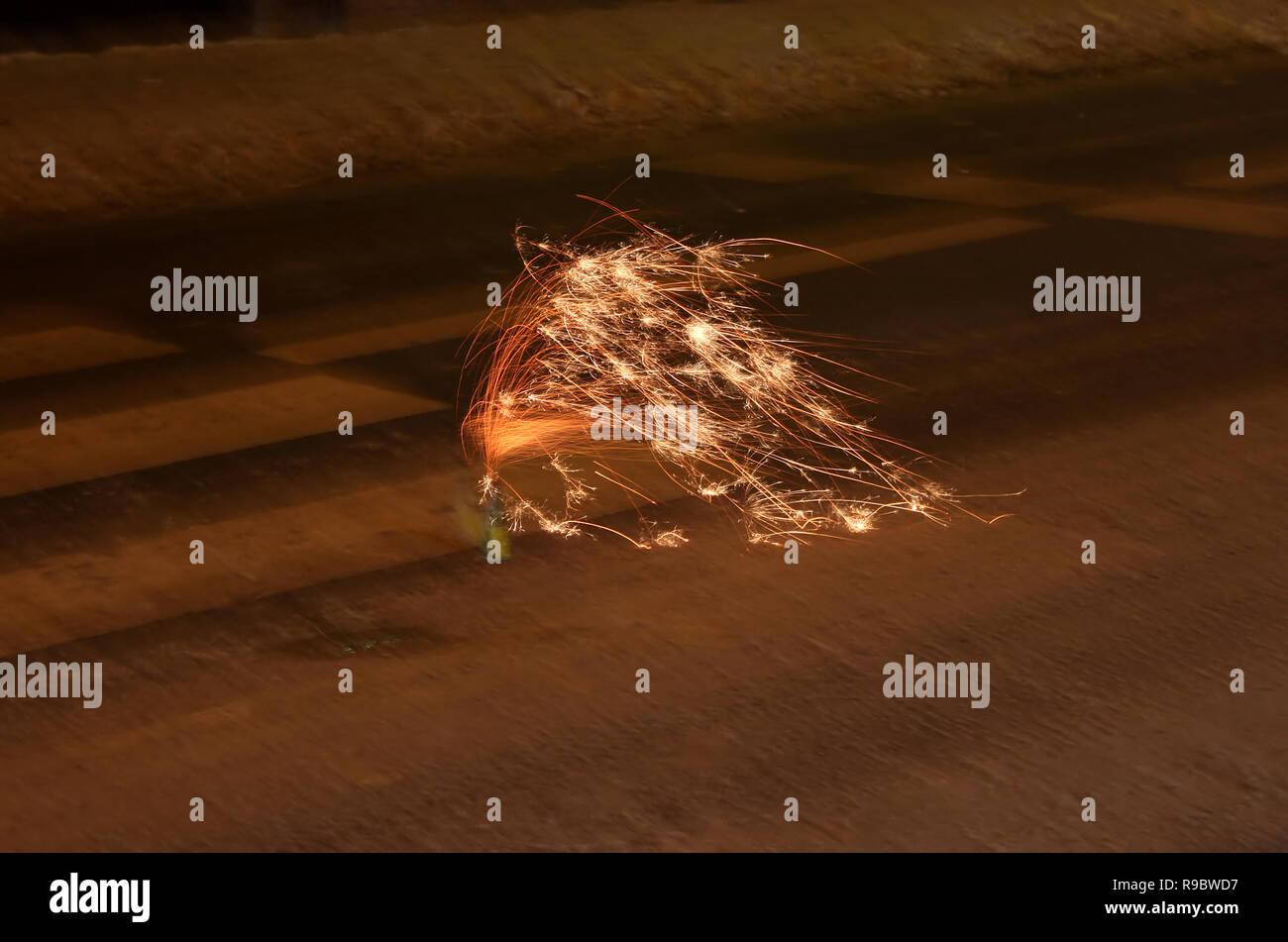 Fireworks explosion on a pedestrian crossing Stock Photo - Alamy