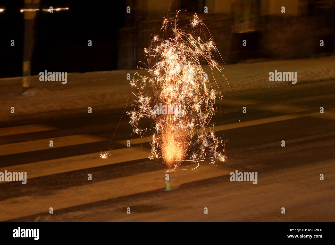 Fireworks explosion on a pedestrian crossing Stock Photo - Alamy