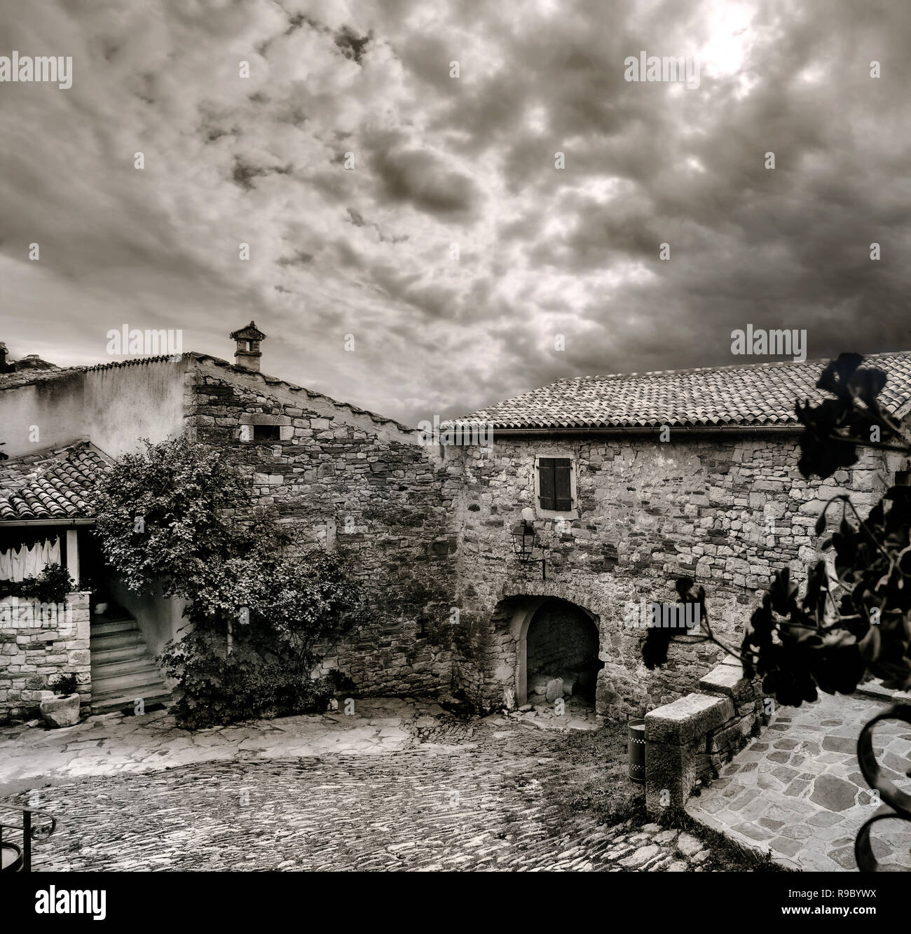 Cityscape of Hum town with small courtyard and old house. Smallest city ...