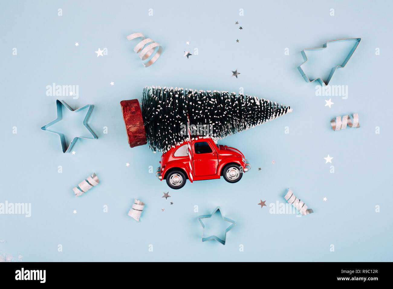 KYIV, UKRAINE - December 12, 2017: Toy red car with fir tree on the ...