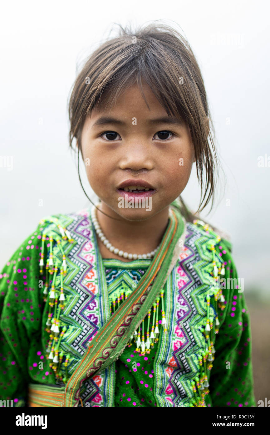Portrait A girl of Hmong ethnicity with her traditional dress on the ...