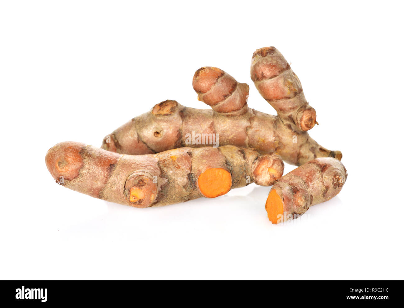 turmeric isolated on white background Stock Photo - Alamy