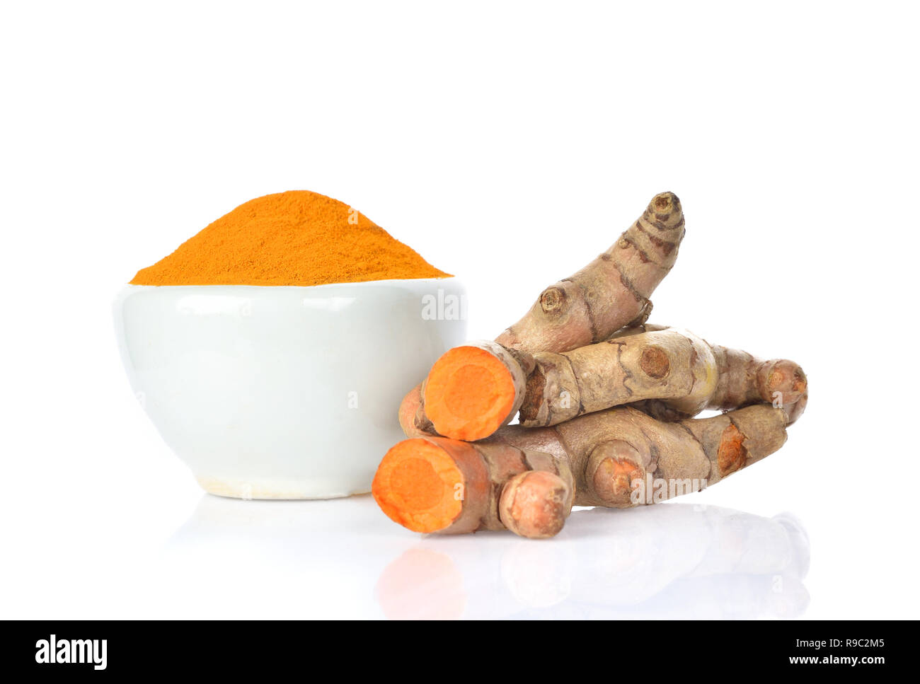 turmeric isolated on white background Stock Photo - Alamy