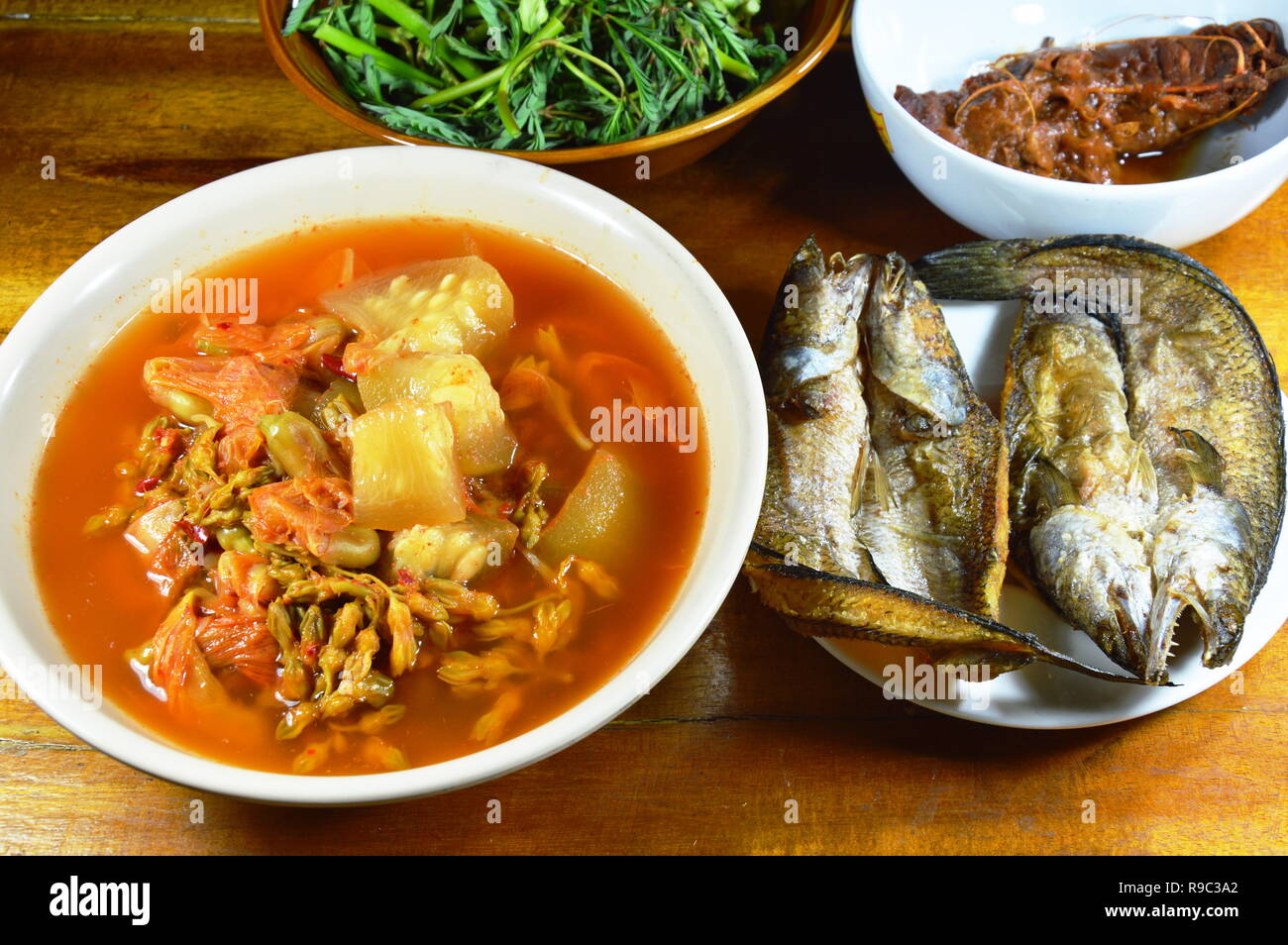 deep fried snake head fish eat couple with mixed vegetable Thai spicy ...
