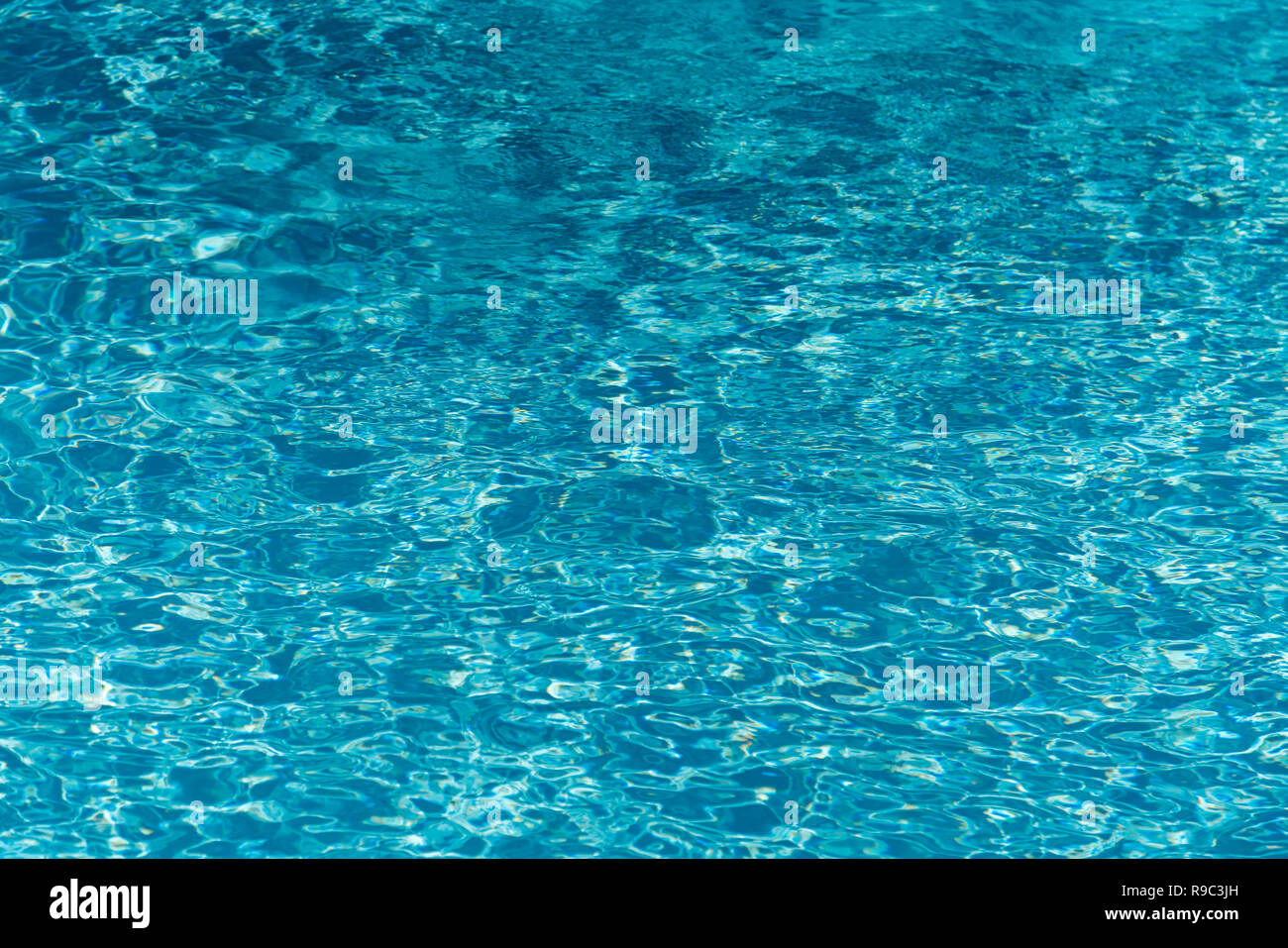 Blue water in swimming pool background. Ripple Water in swimming pool ...