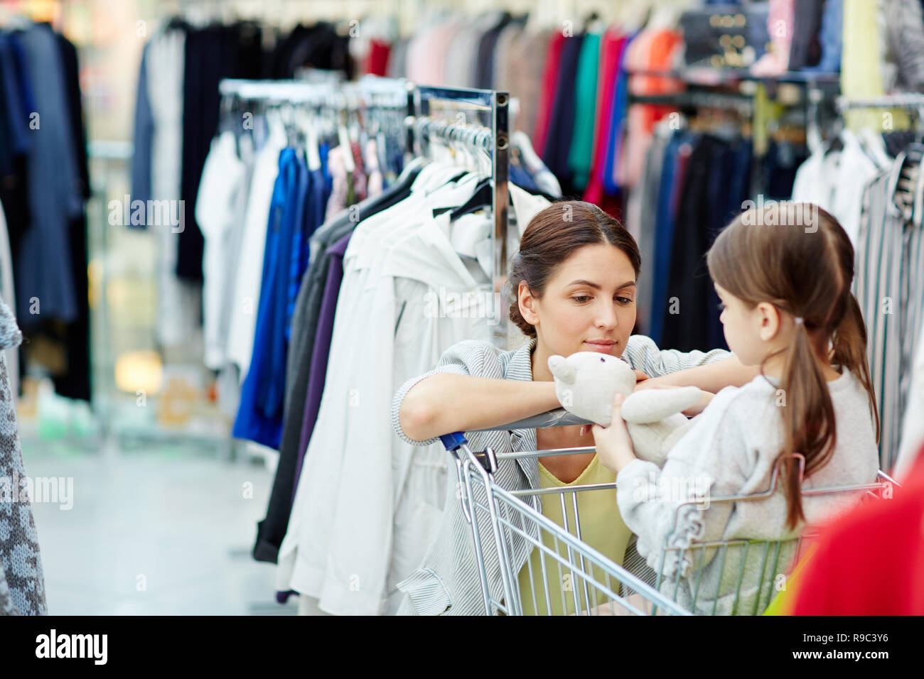 Shopping in clothing department Stock Photo - Alamy