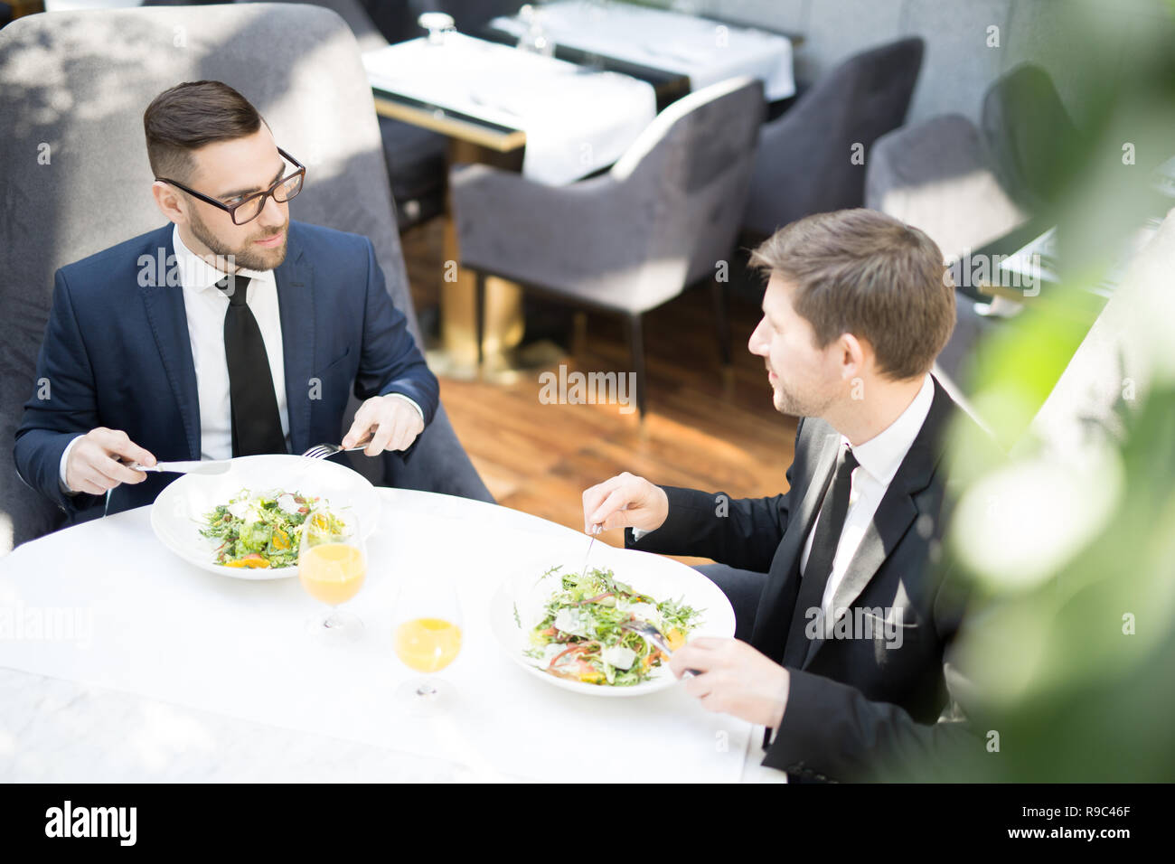 Eating in restaurant Stock Photo - Alamy
