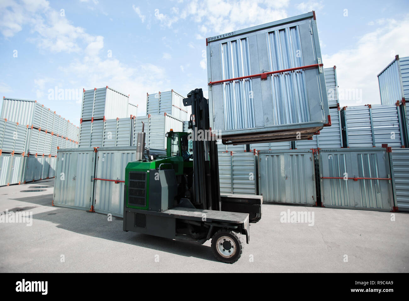 Forklift moving container hi-res stock photography and images - Alamy