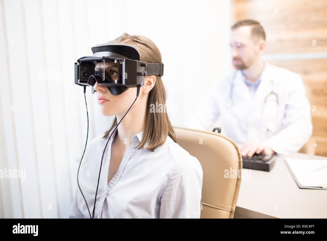 Checking retina hi-res stock photography and images - Alamy