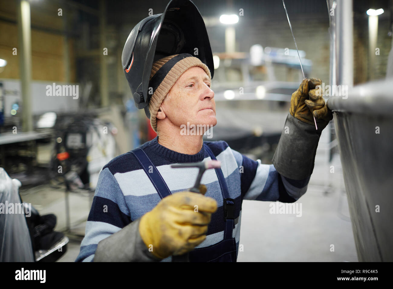 Working over ship construction Stock Photo - Alamy