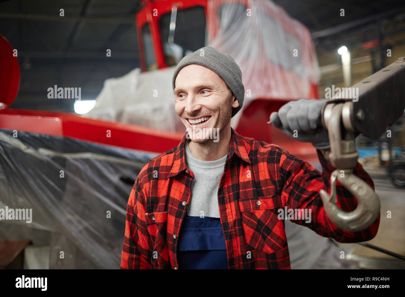 Working in factory Stock Photo - Alamy