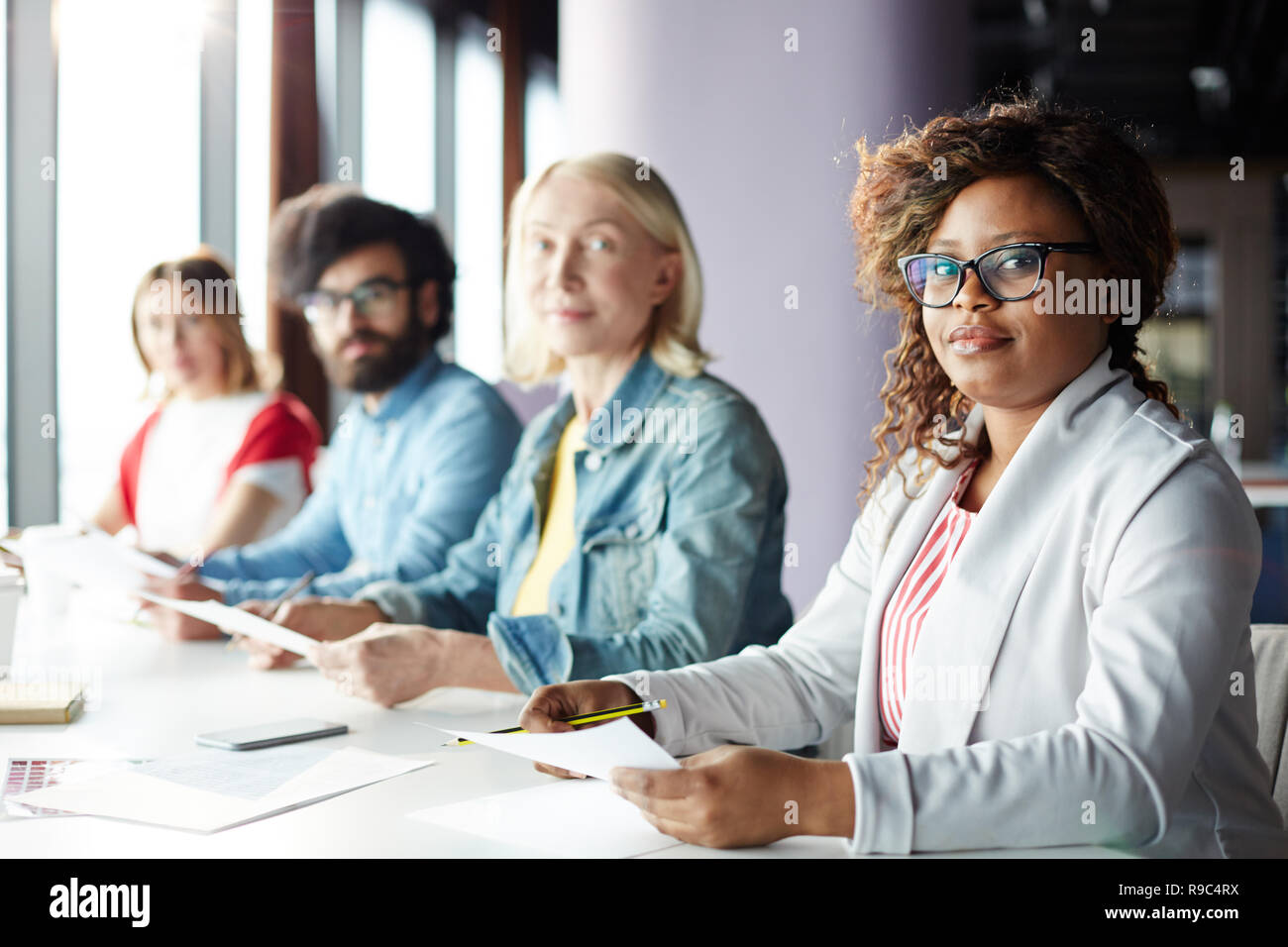 Business students studying at training class Stock Photo - Alamy