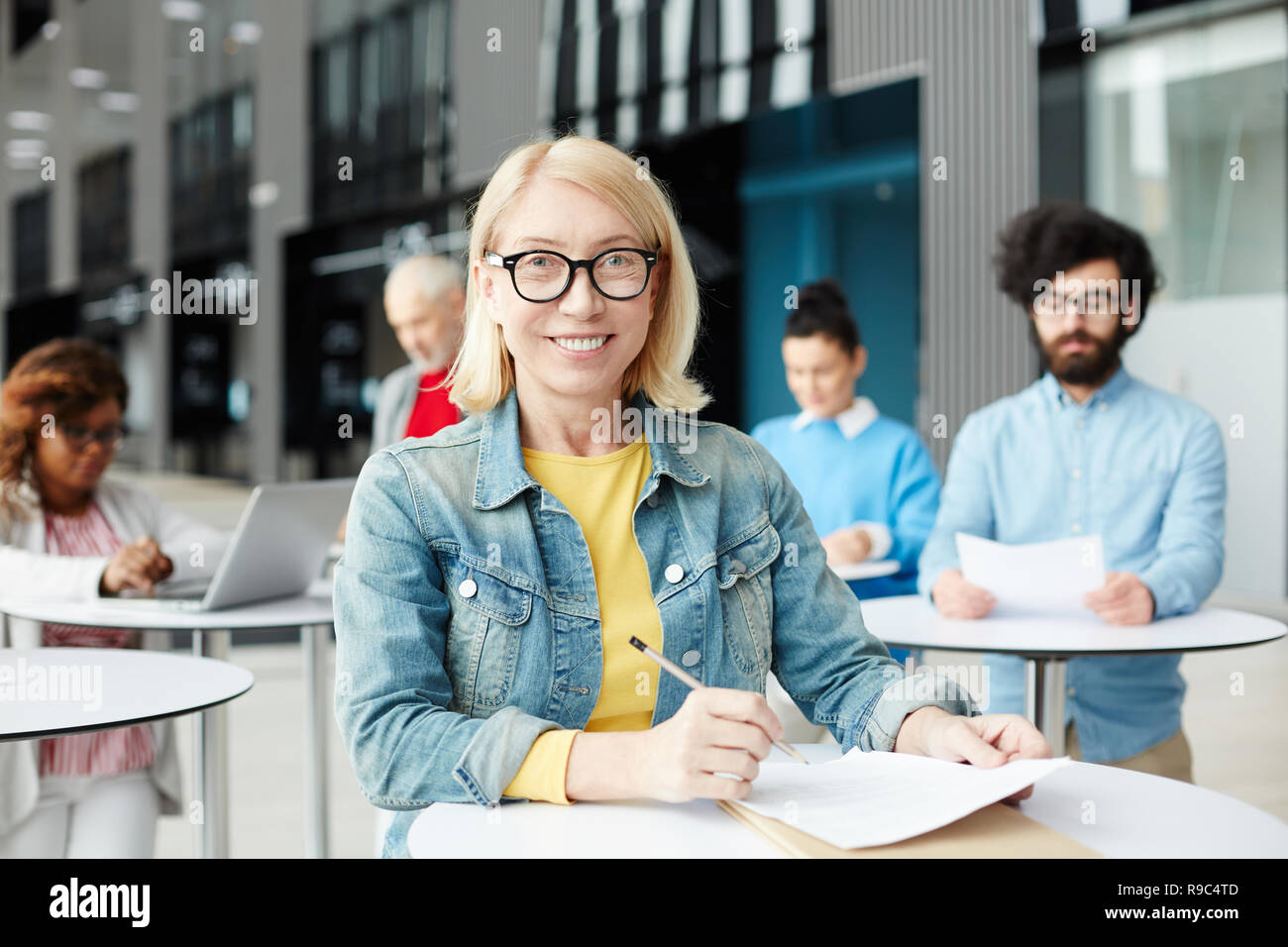 Conference registration table hi-res stock photography and images - Alamy