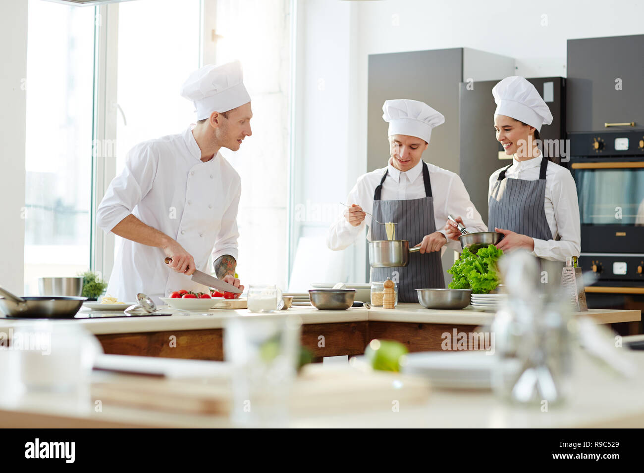 Helping in the kitchen Stock Photo - Alamy