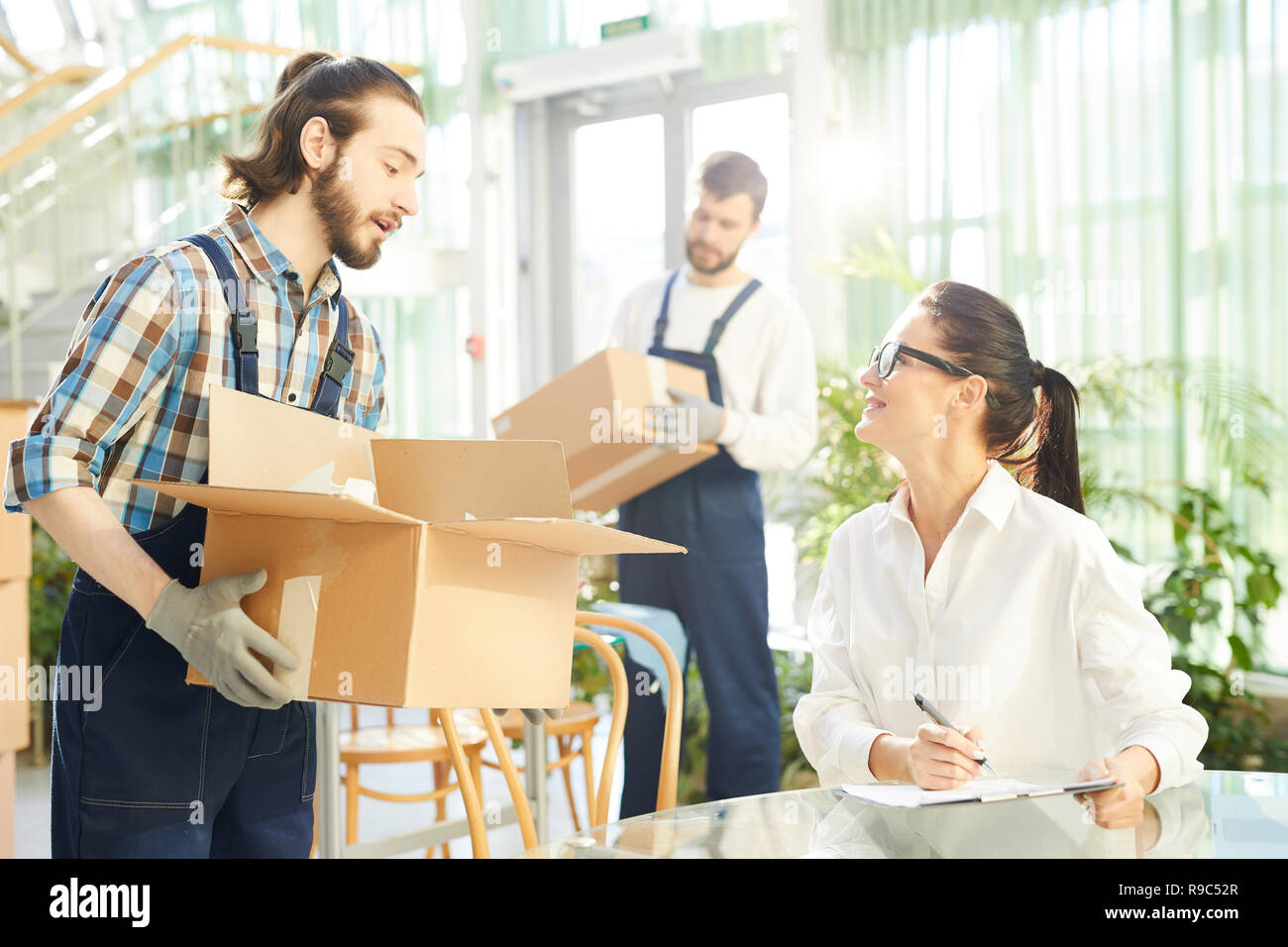 Giving tasks hi-res stock photography and images - Alamy