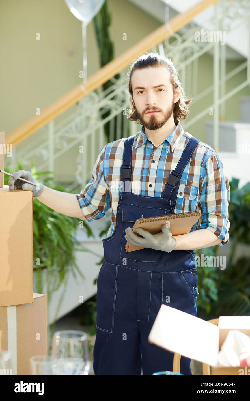 Young mover responsible for delivery Stock Photo - Alamy