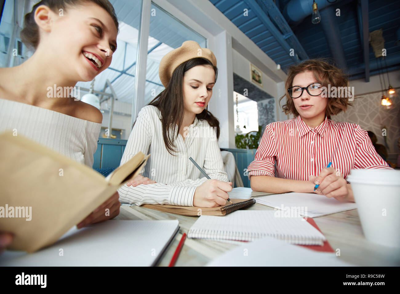 Girls in cafe Stock Photo - Alamy