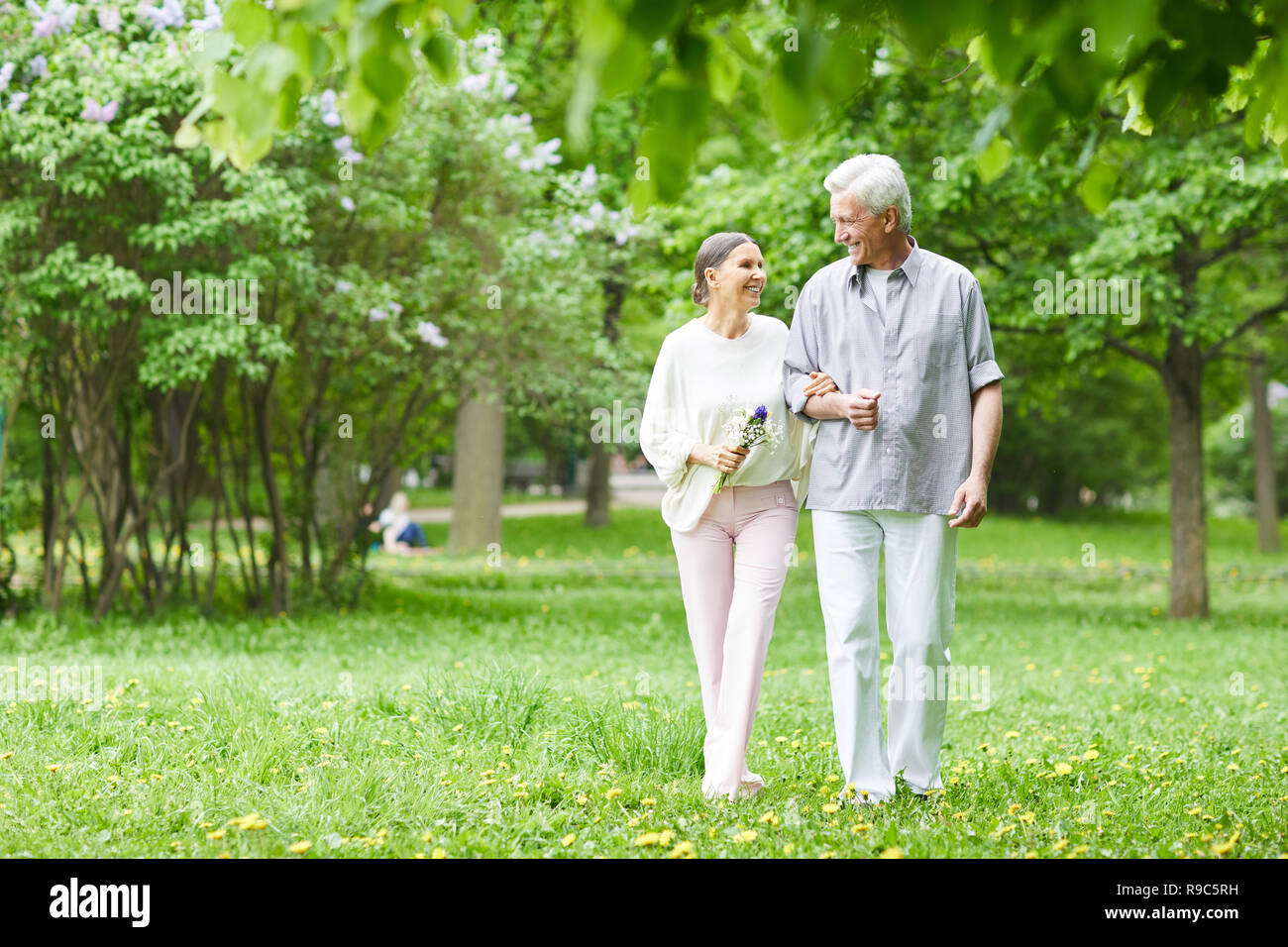 Adult walk park hi-res stock photography and images - Alamy