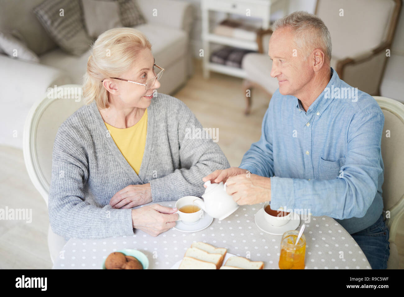 Seniors having tea Stock Photo - Alamy
