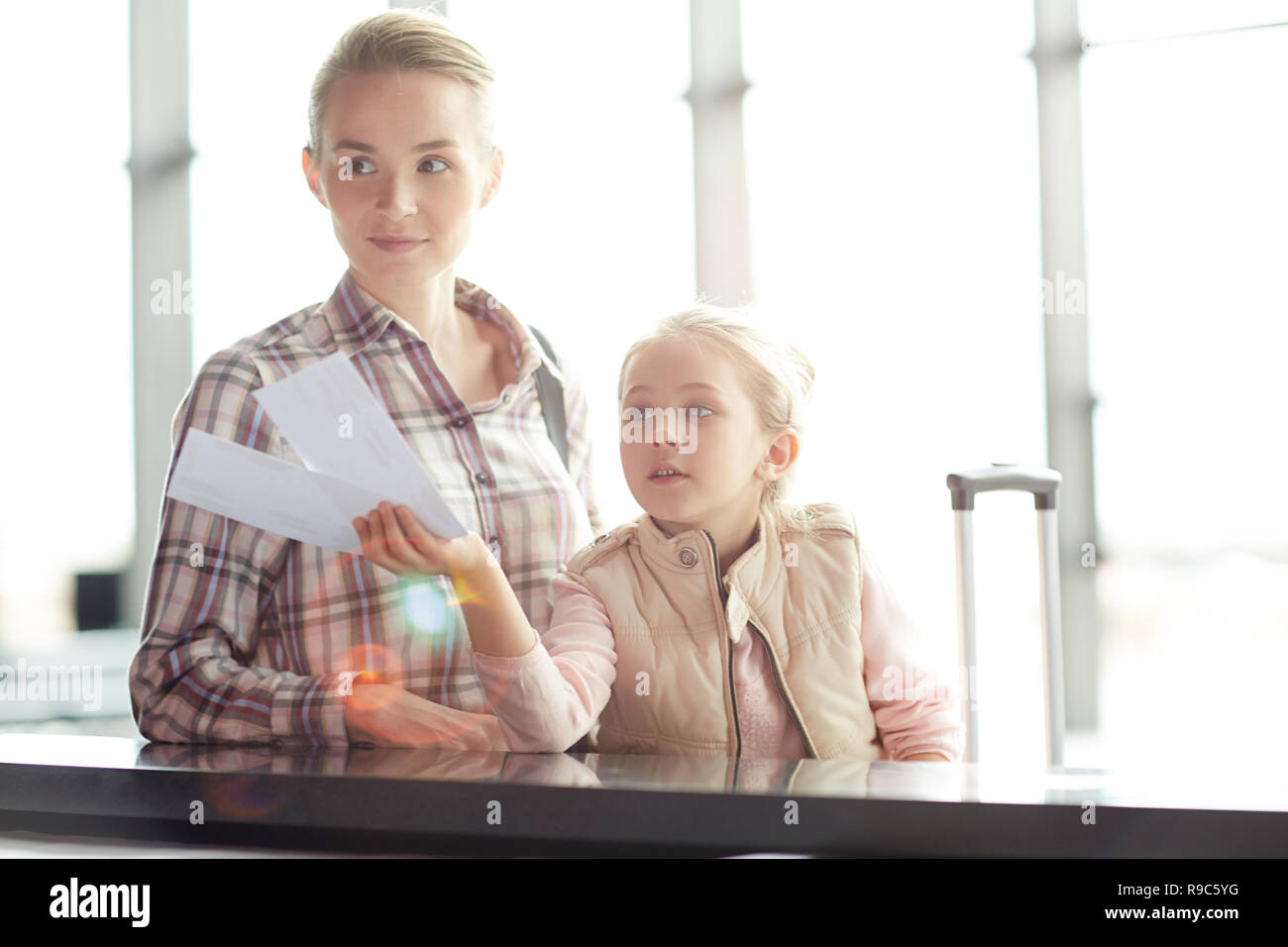 Checking in tickets Stock Photo - Alamy