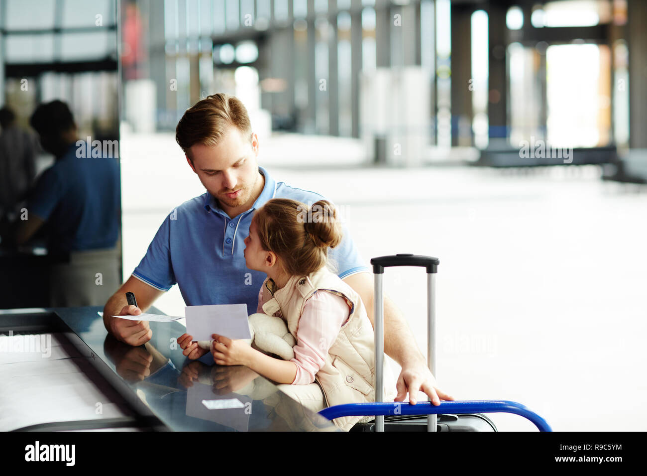 Girl check in airport hi-res stock photography and images - Alamy