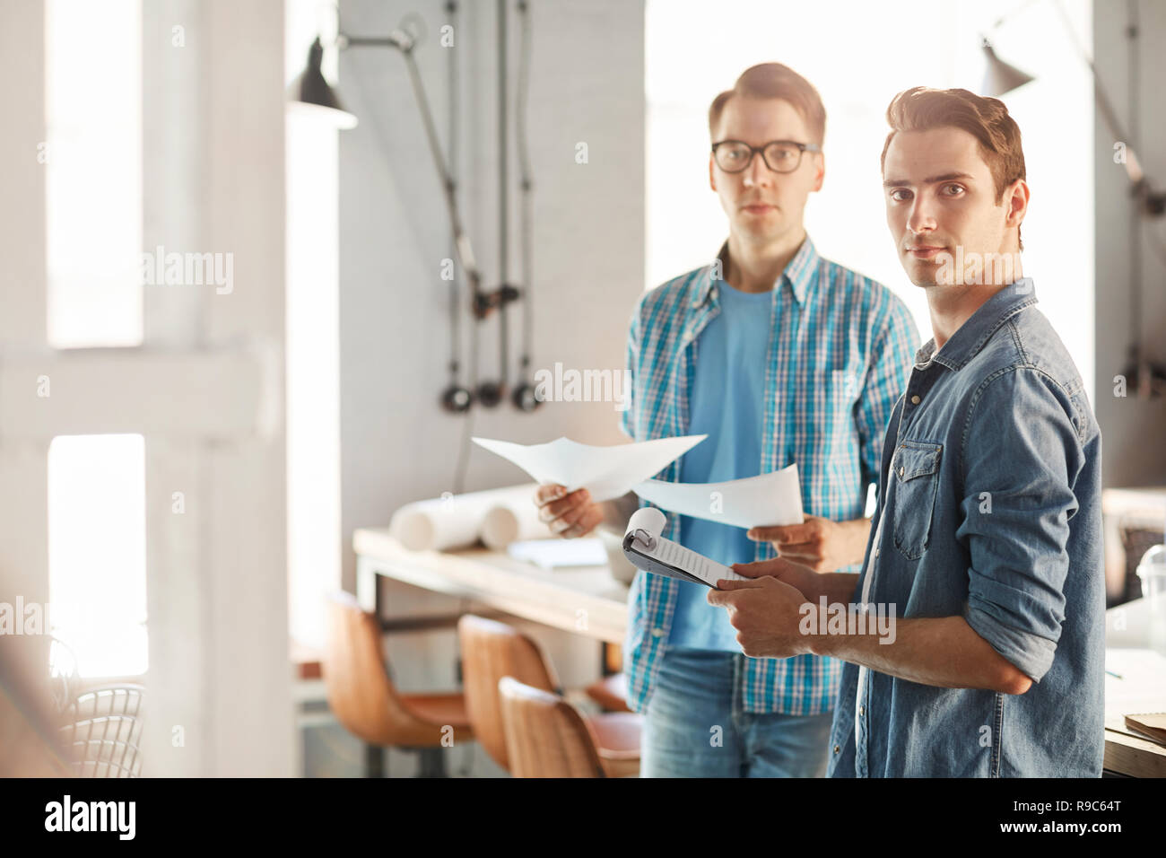 Men working in office Stock Photo - Alamy