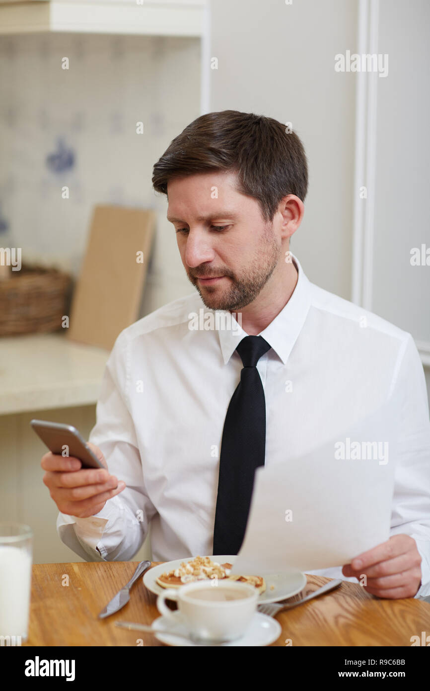 Texting at dinner table hi-res stock photography and images - Alamy