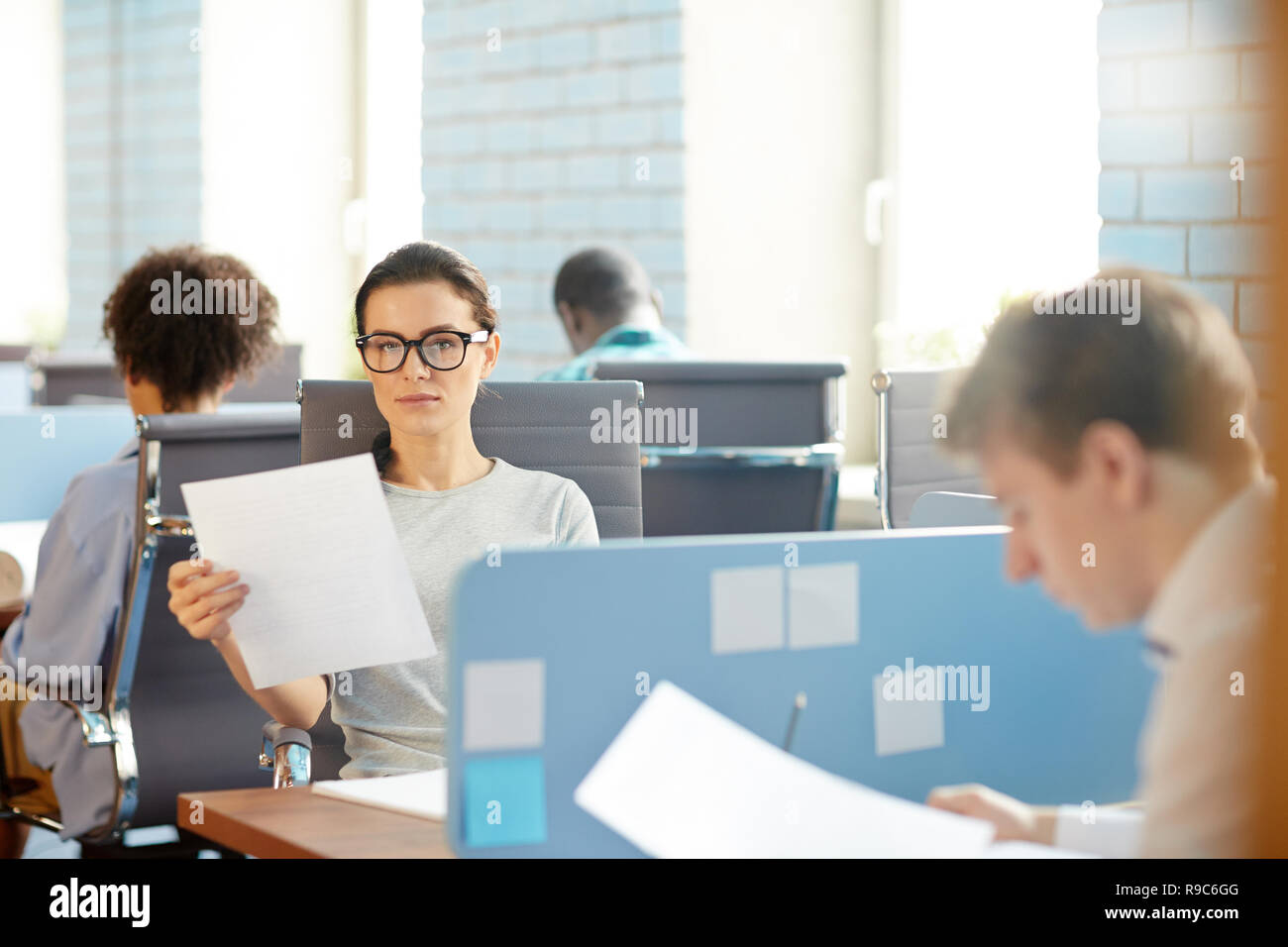 Employee with paper Stock Photo - Alamy