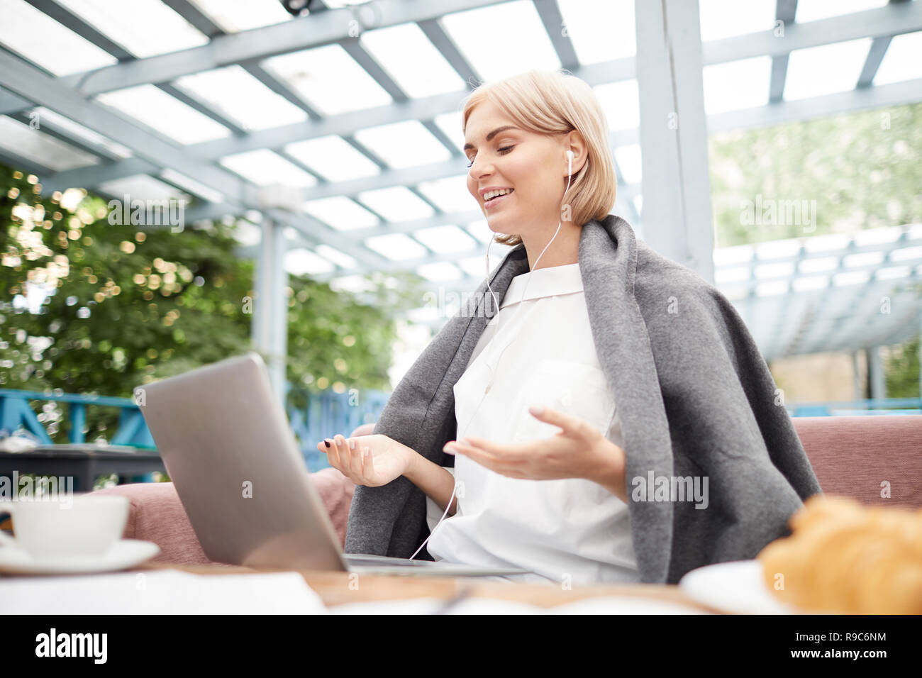 Young woman video calling hi-res stock photography and images - Alamy