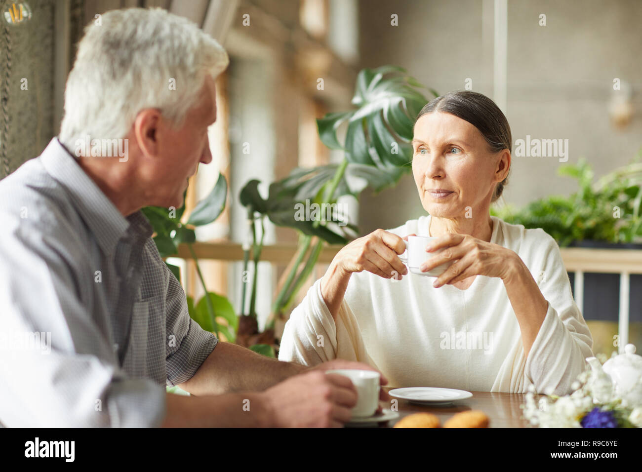 Relaxing by cup of tea Stock Photo - Alamy