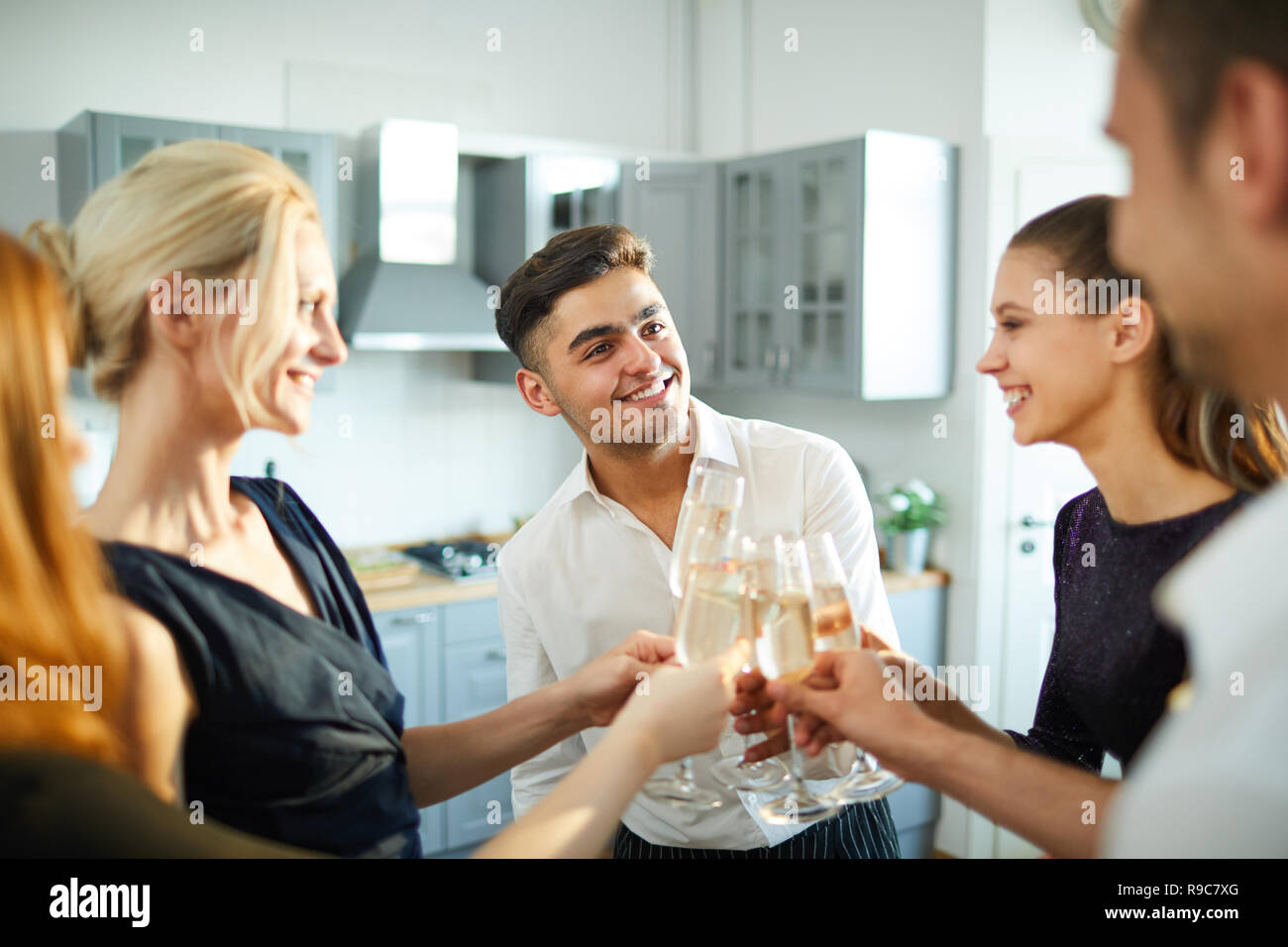 Happy and toasting Stock Photo - Alamy