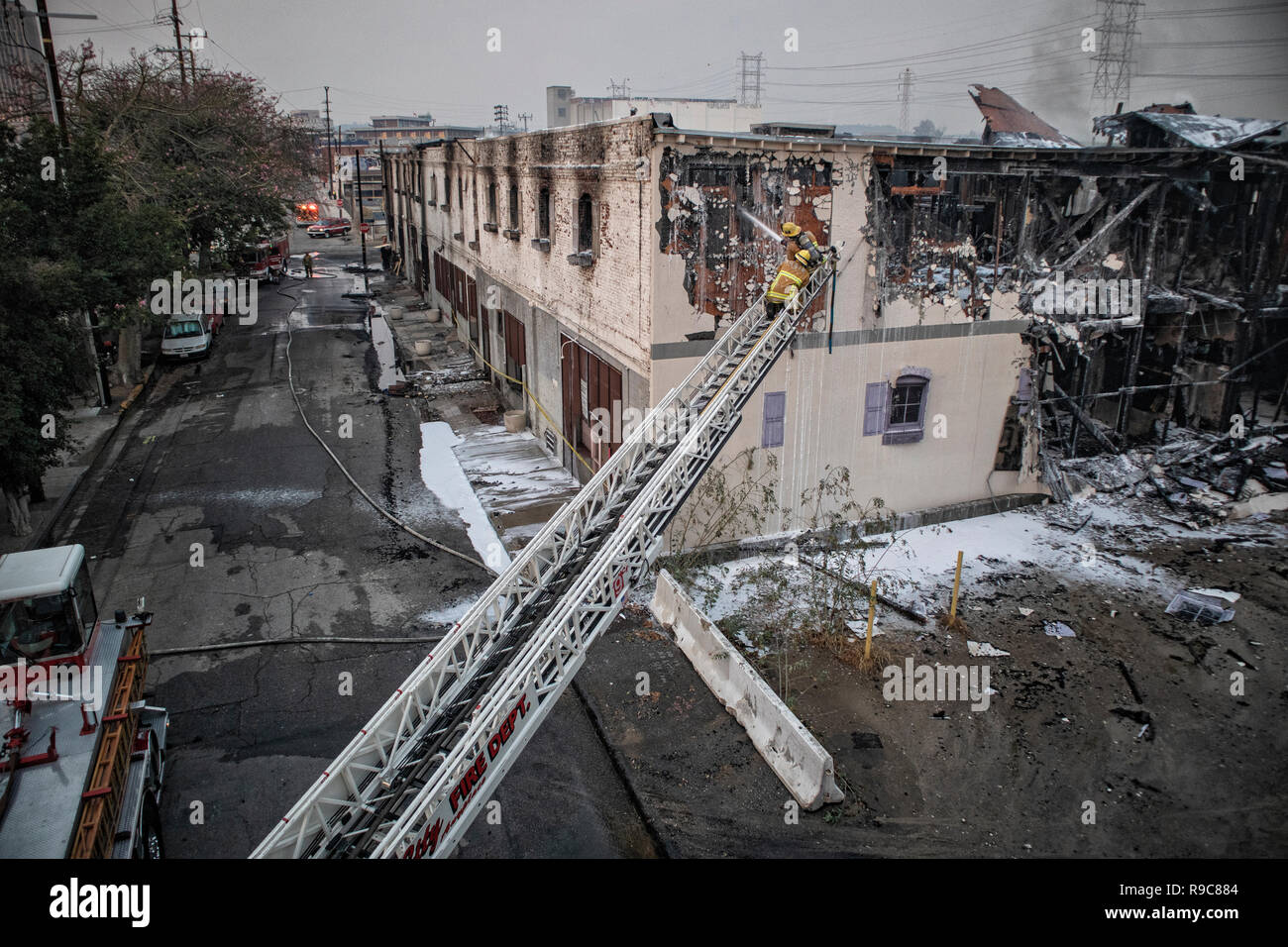 Fire fighters putting out warehosue fire in Downtown Los Angeles near ...