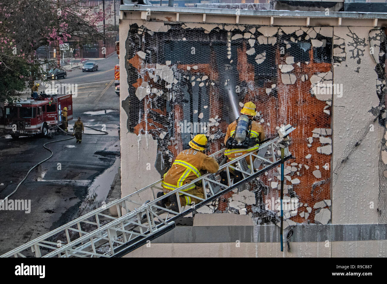 Fire fighters putting out warehosue fire in Downtown Los Angeles near ...