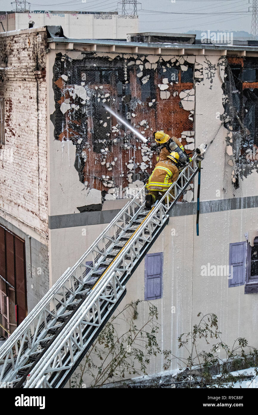 Fire fighters putting out warehosue fire in Downtown Los Angeles near ...