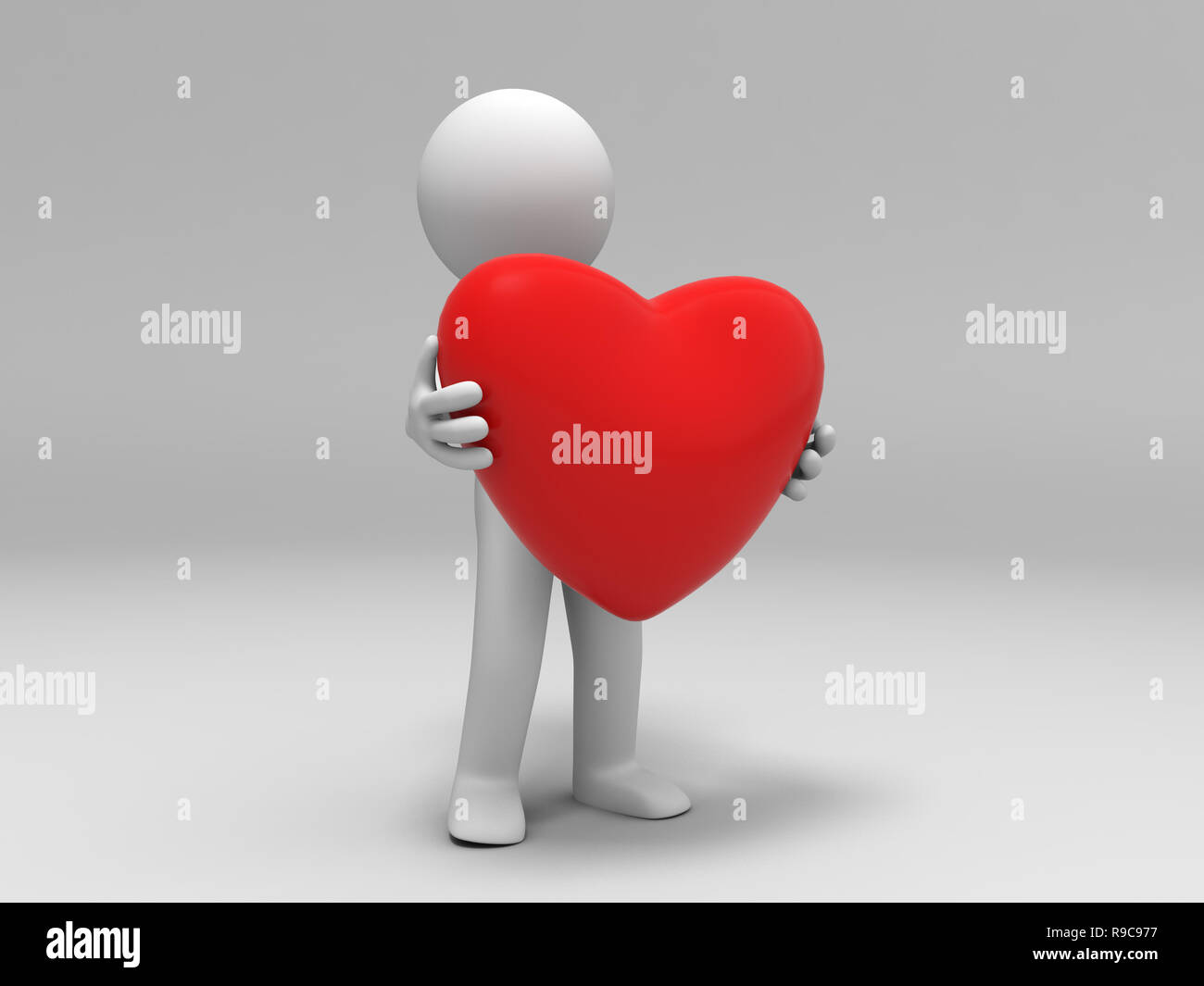 A man holding a heart Stock Photo - Alamy