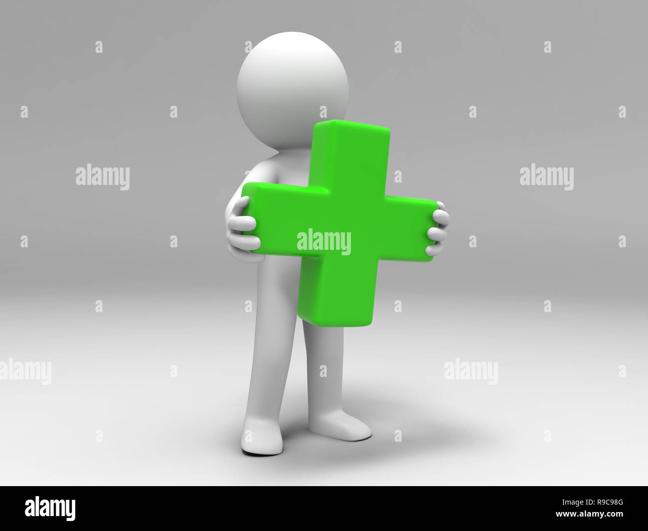 A man holding a heart a cross Stock Photo - Alamy